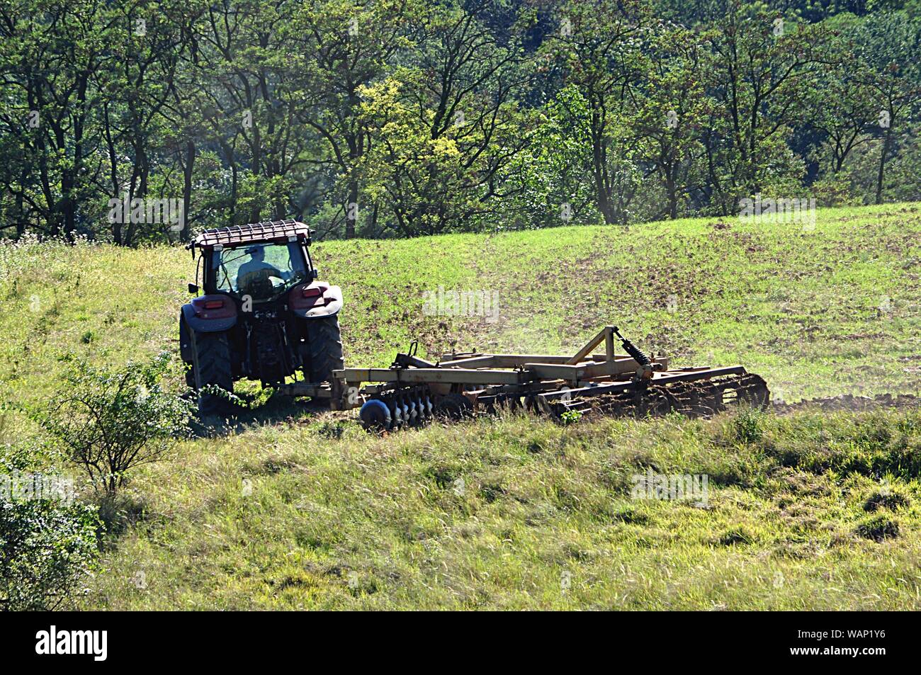 tractor and field Stock Photo - Alamy