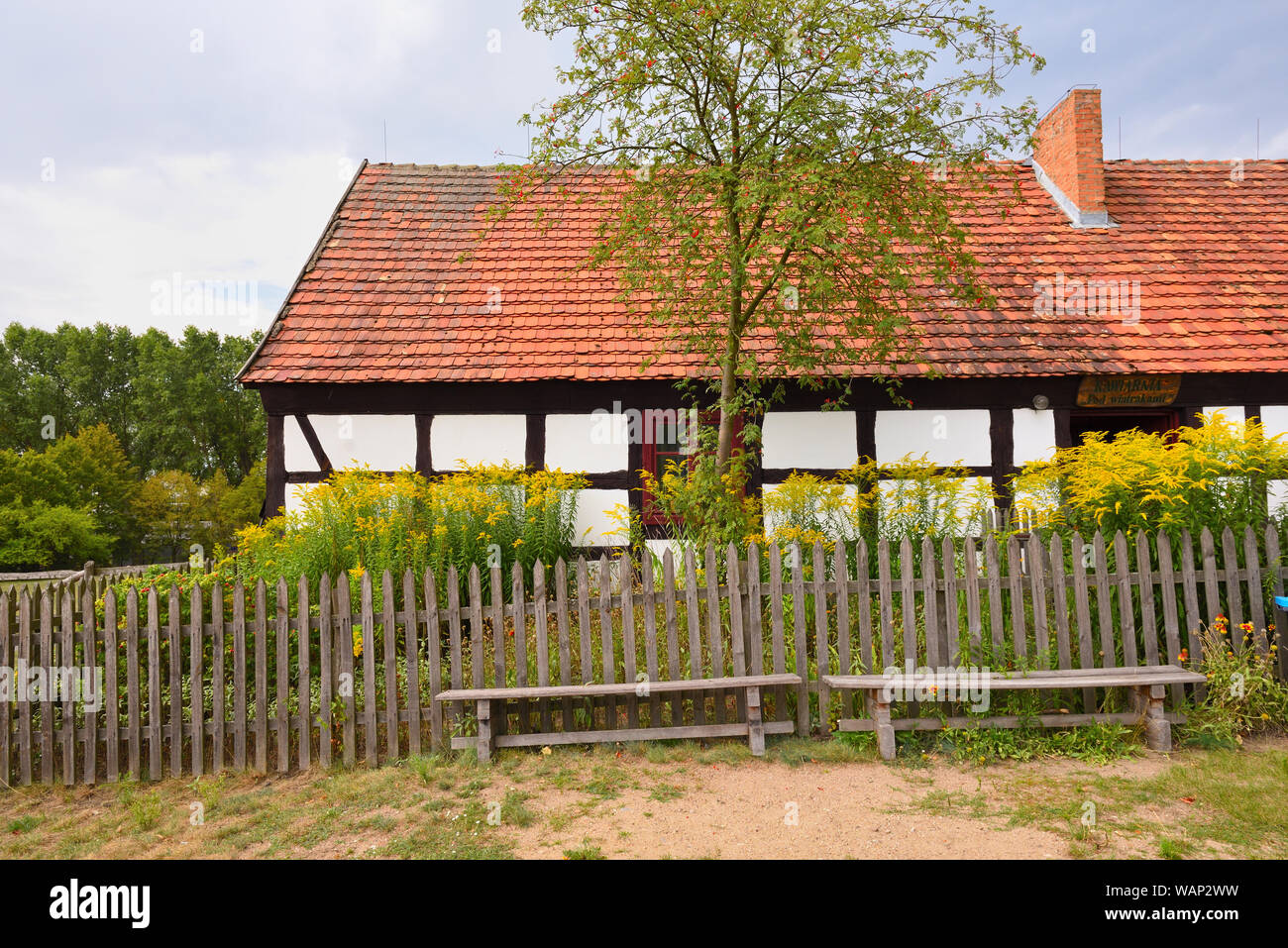Old whitewashed house in The Folk Culture Museum in Osiek by the river ...