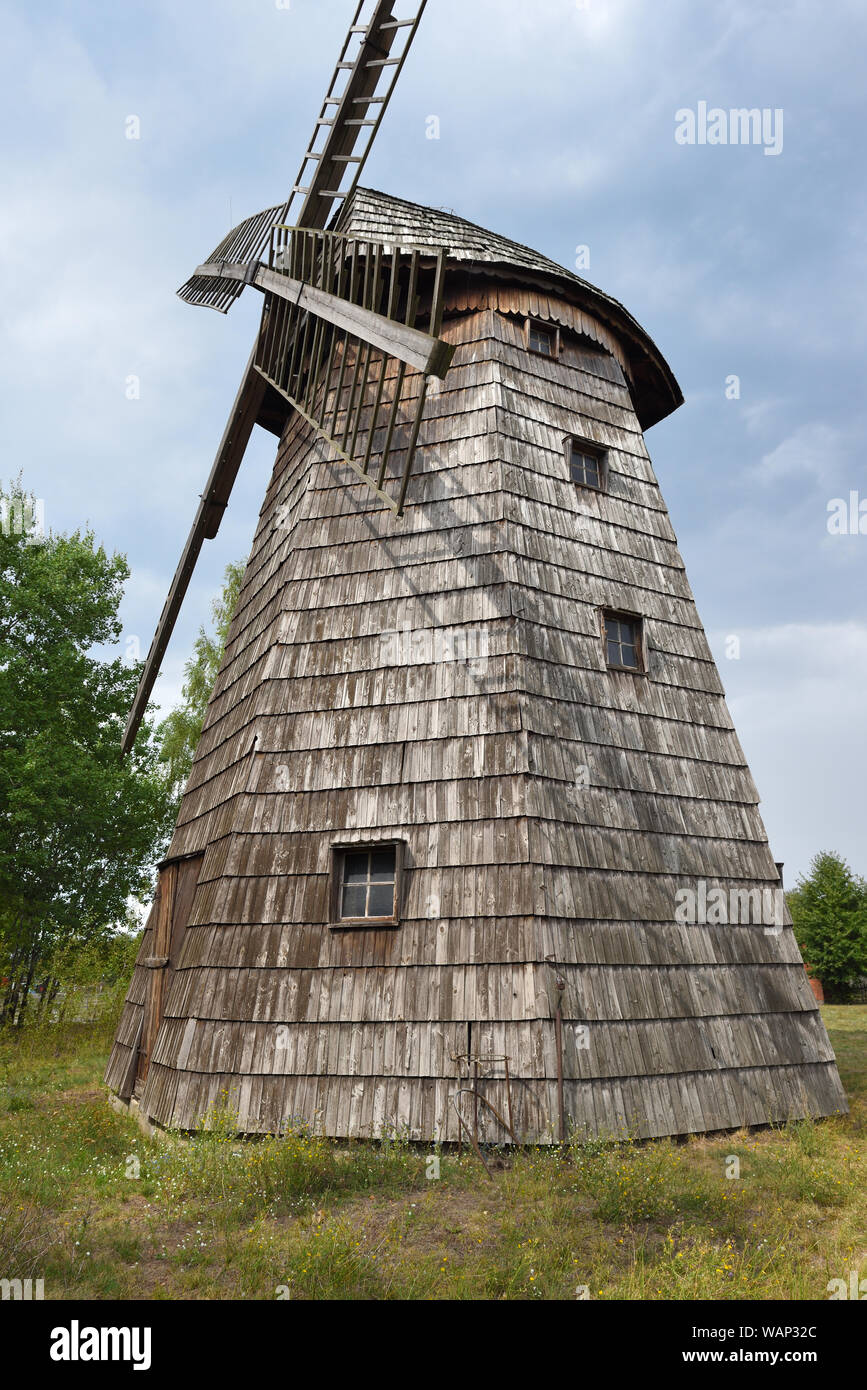 Old wooden windmill in The Folk Culture Museum in Osiek by the river ...