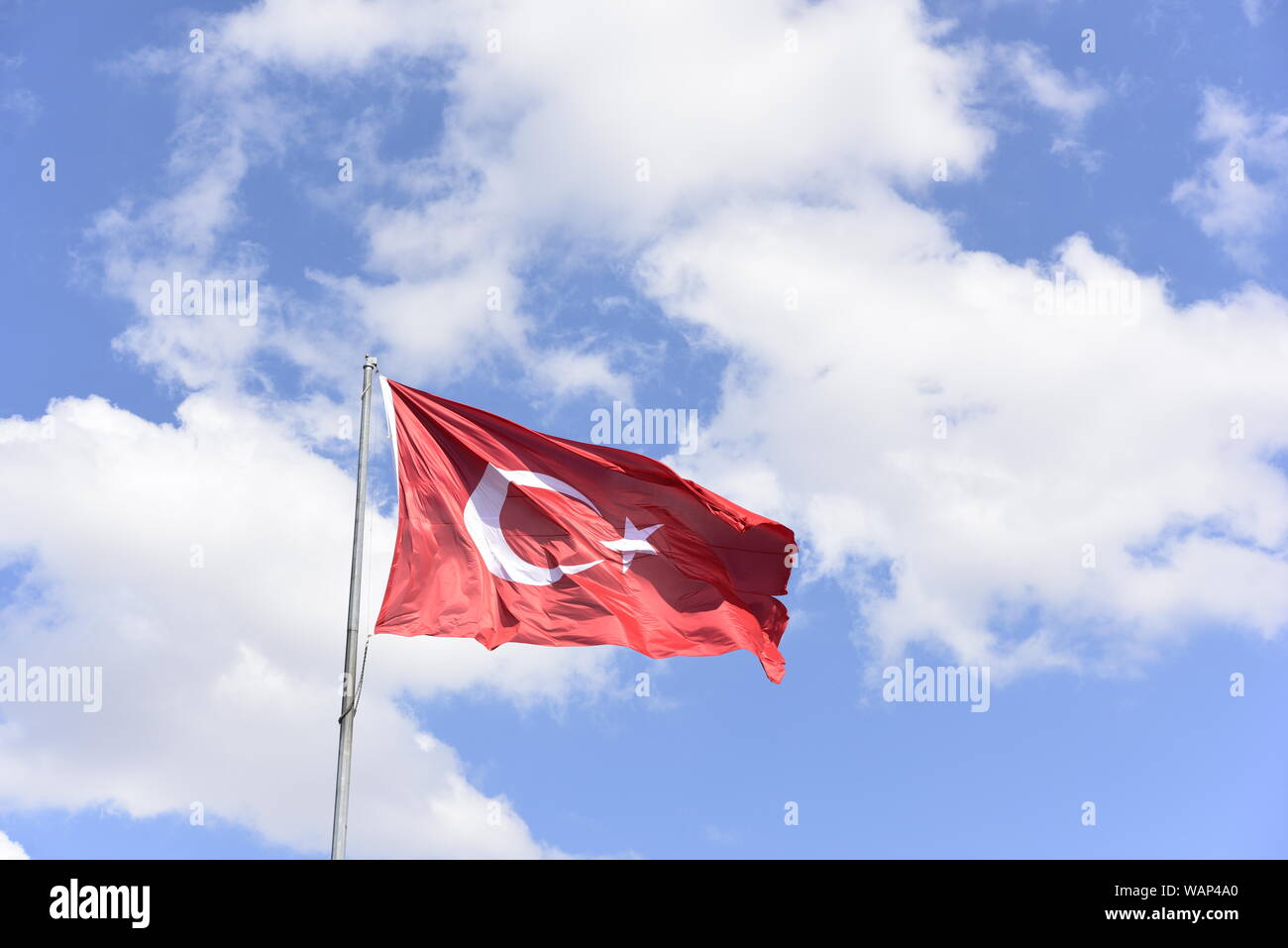 Turkish flag waving in sky Stock Photo - Alamy