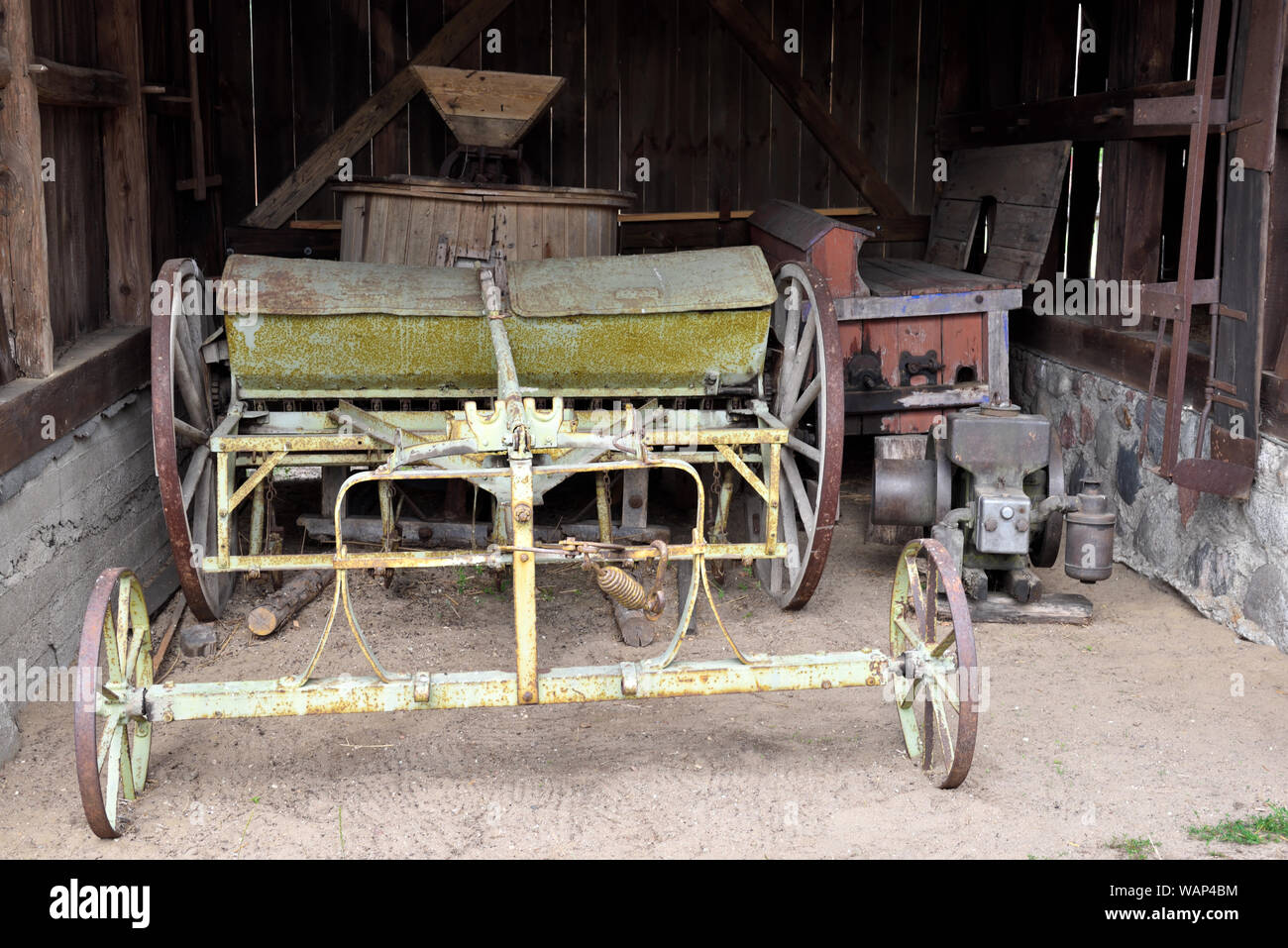 Old agricultural machinery in The Folk Culture Museum in Osiek by the ...