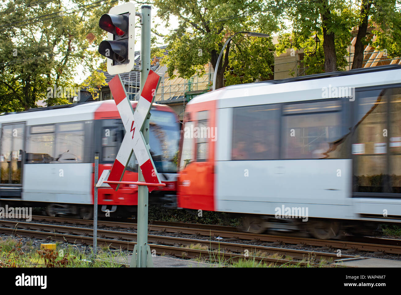 Passengers crossing the tram track hi-res stock photography and images ...