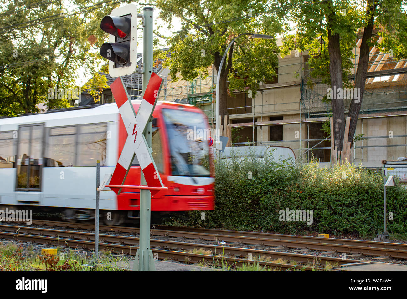 Passengers crossing the tram track hi-res stock photography and images ...