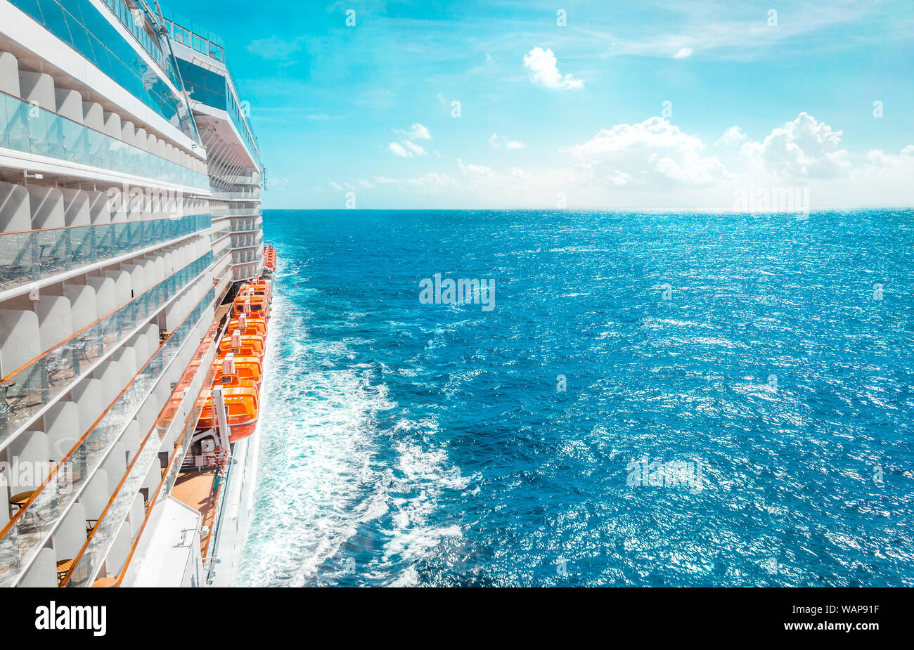 Side view of cruise ship on the blue sky background Stock Photo - Alamy