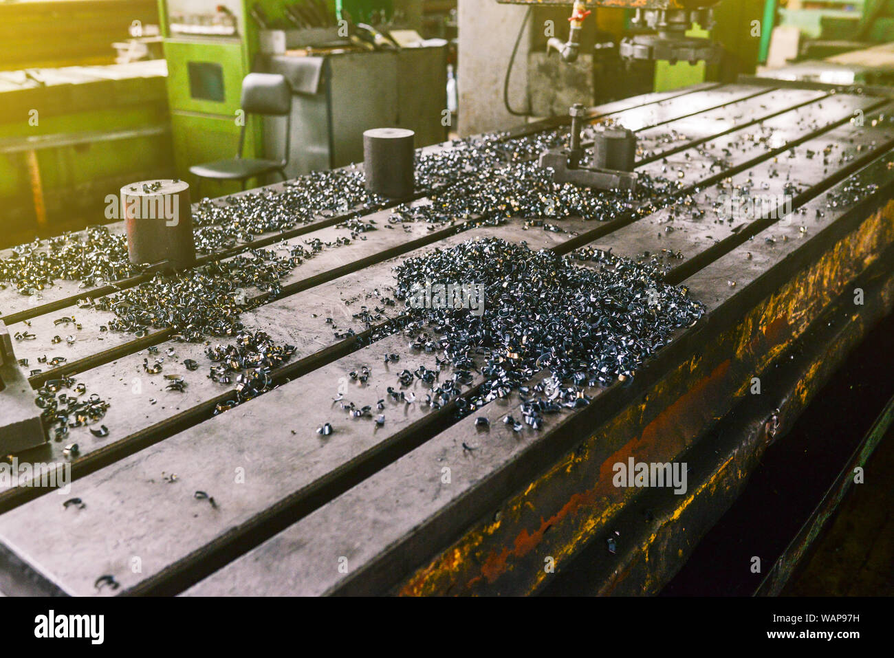 Metal shavings on the machine. The metalworking process at the factory ...