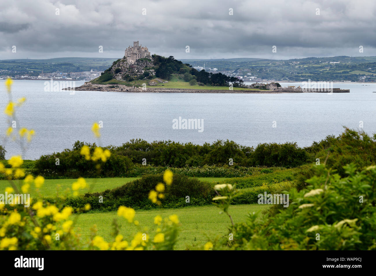 St Michael's Mount tidal island under cloudy skies in Mounts Bay from ...
