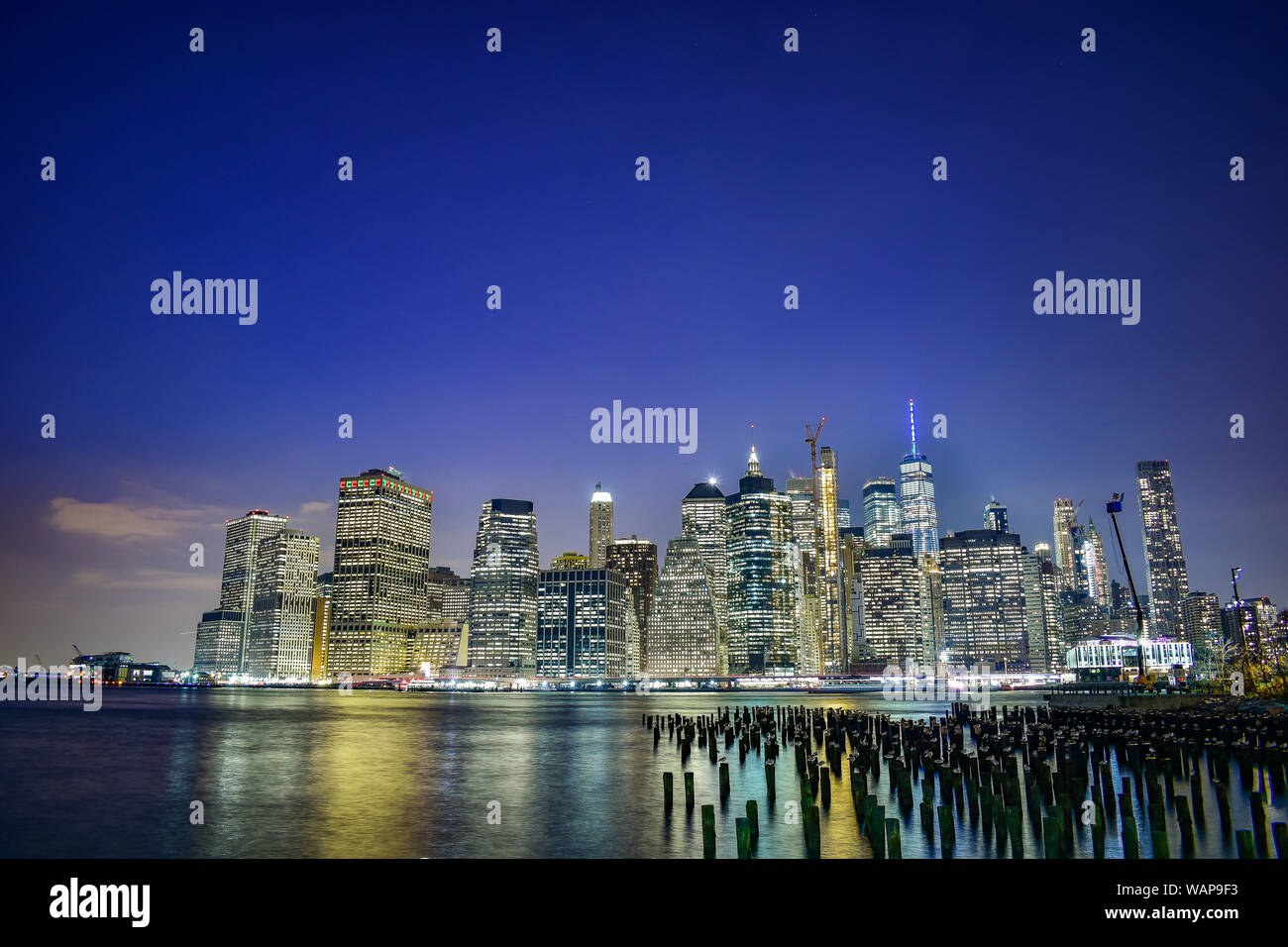 View of Lower Manhattan from Brooklyn Bridge Park during Blue Hour in ...