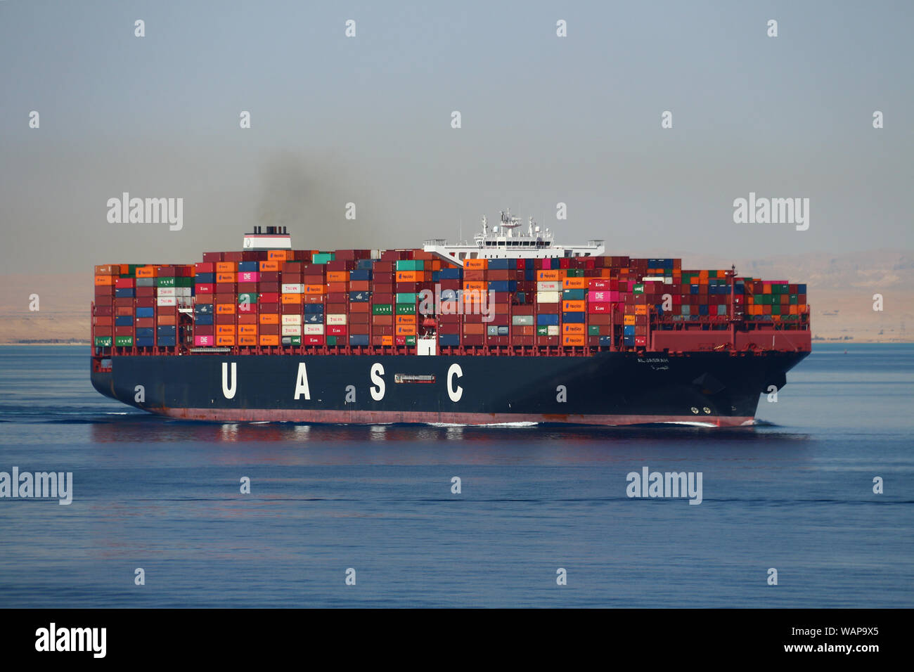 Container ship Al Jasrah leaving the Suez Canal and heading into the ...
