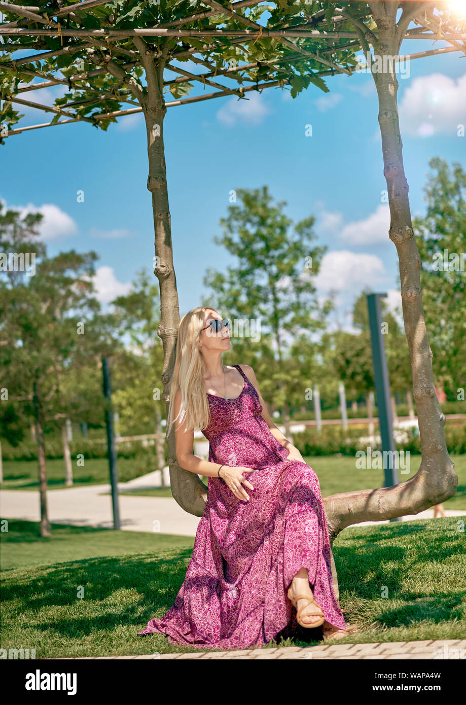 Girl in dress playing hi-res stock photography and images - Alamy