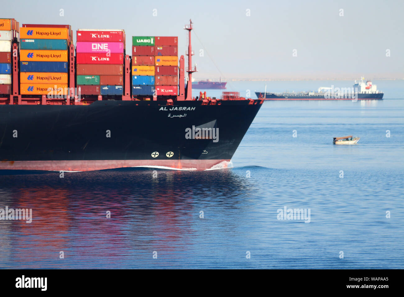Container ship Al Jasrah leaving the Suez Canal and heading into the ...