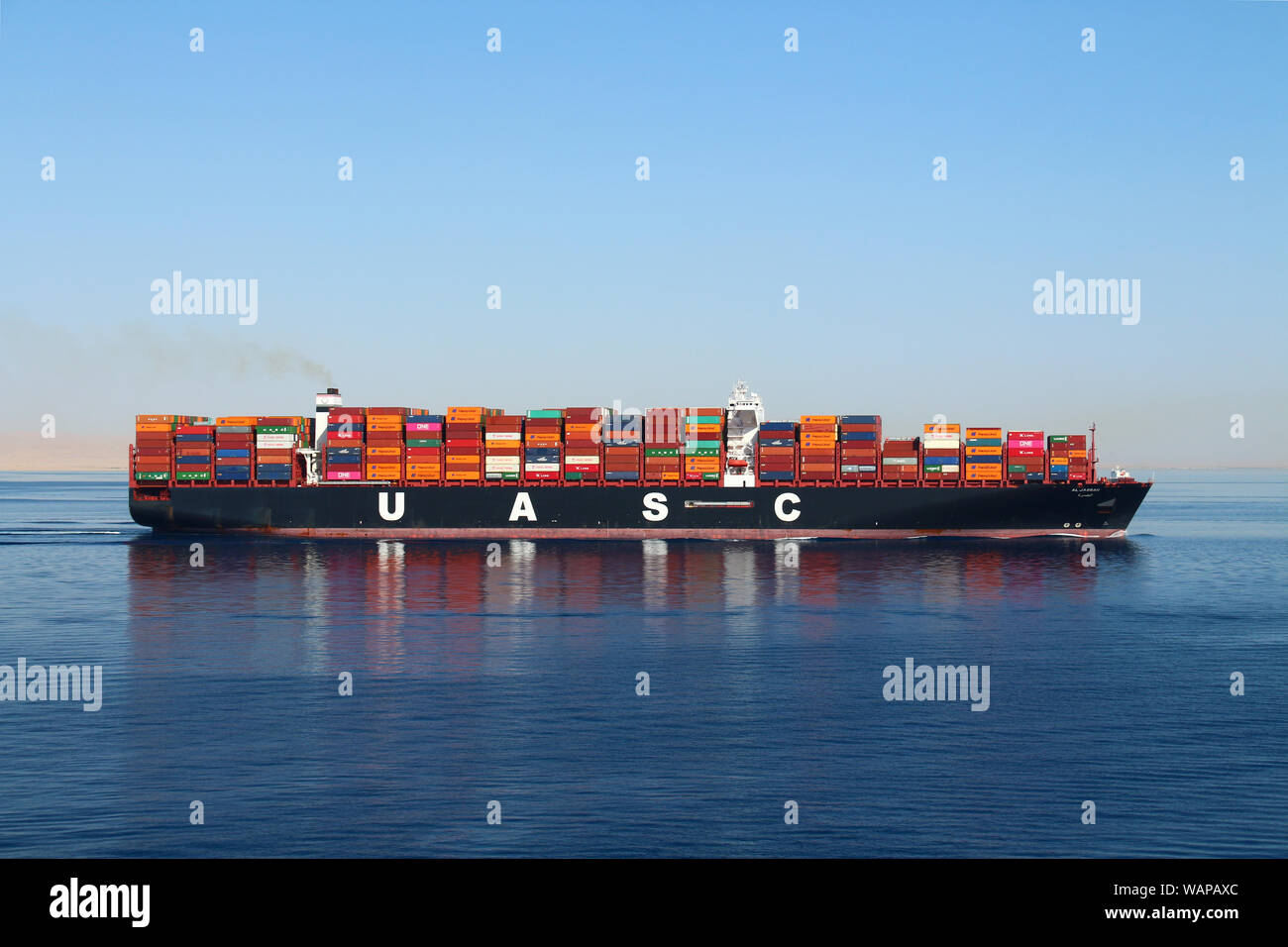 Container ship Al Jasrah leaving the Suez Canal and heading into the ...