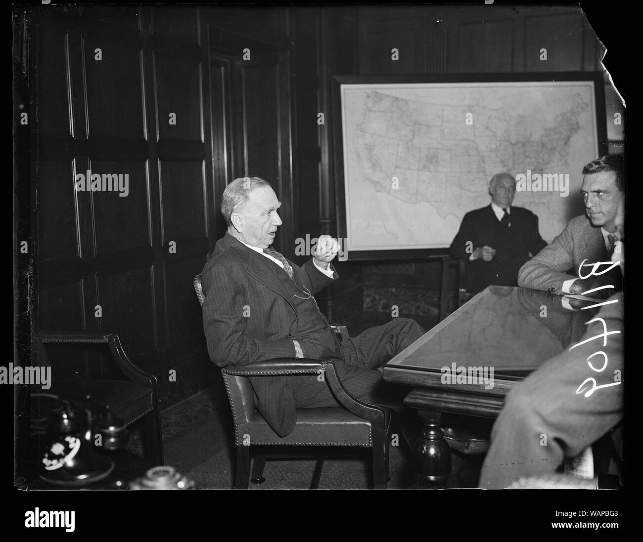 Daniel C. Roper at desk Stock Photo - Alamy