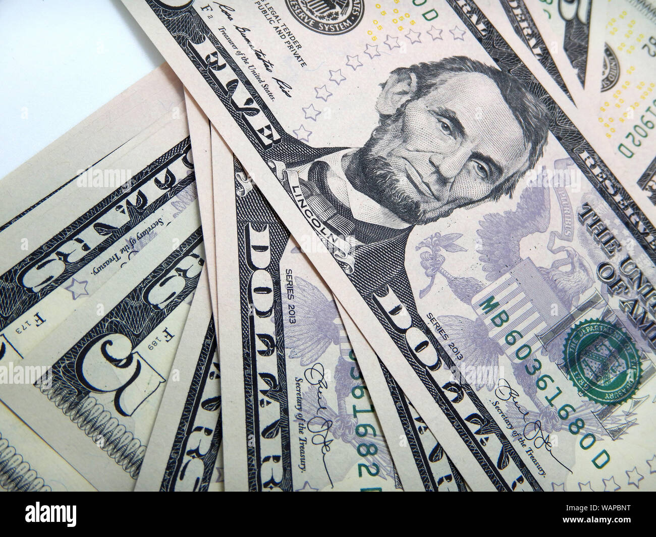Money, Five dollar banknotes Stock Photo - Alamy