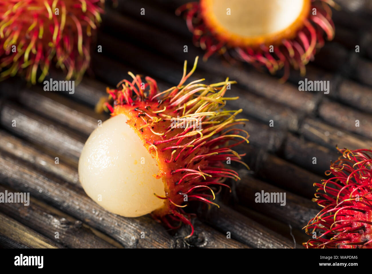 Raw Red Organic Rambutan Fruit Ready to Eat Stock Photo - Alamy