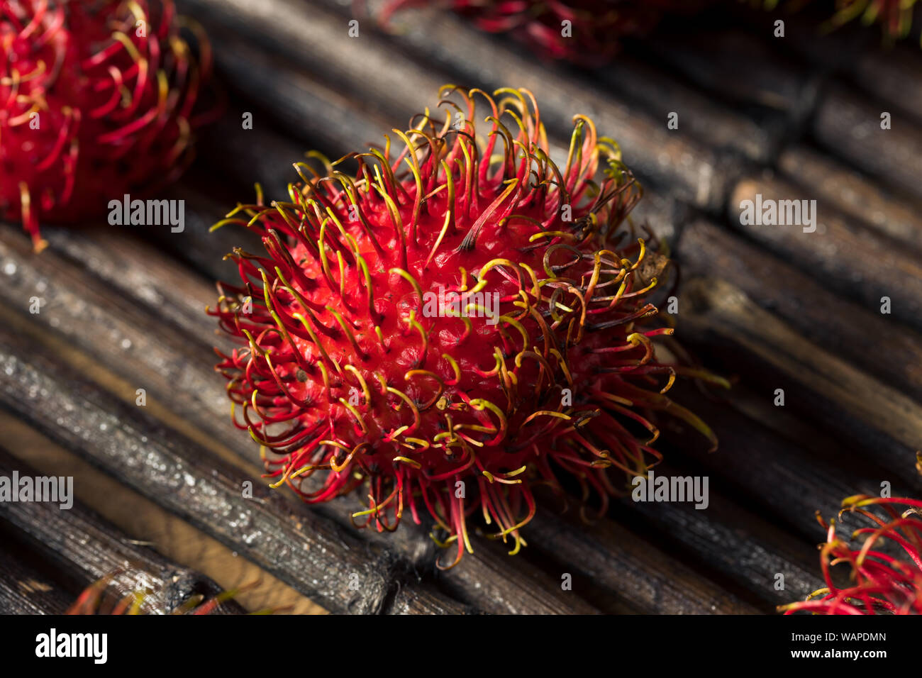 Raw Red Organic Rambutan Fruit Ready to Eat Stock Photo - Alamy