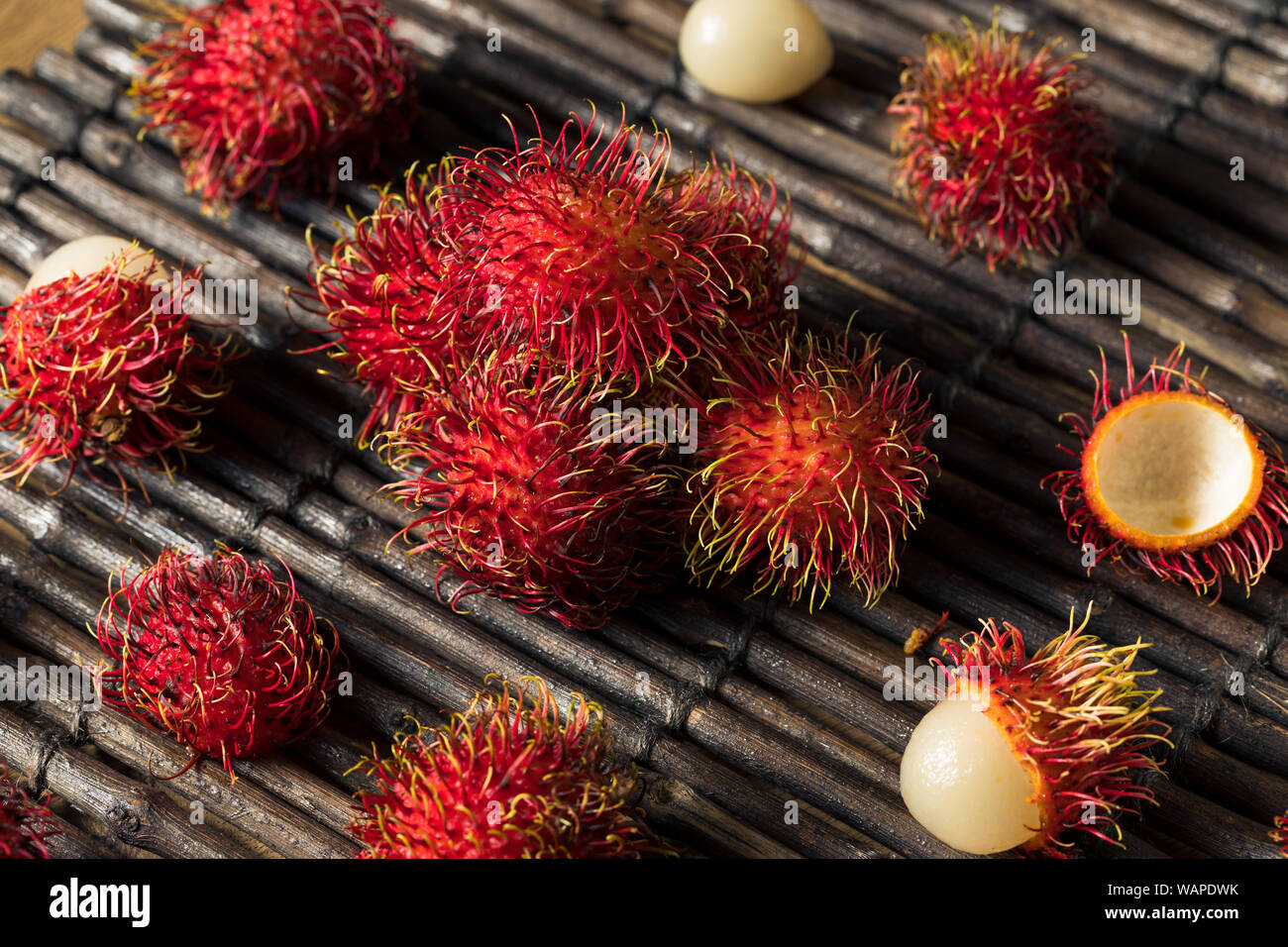 Raw Red Organic Rambutan Fruit Ready to Eat Stock Photo - Alamy