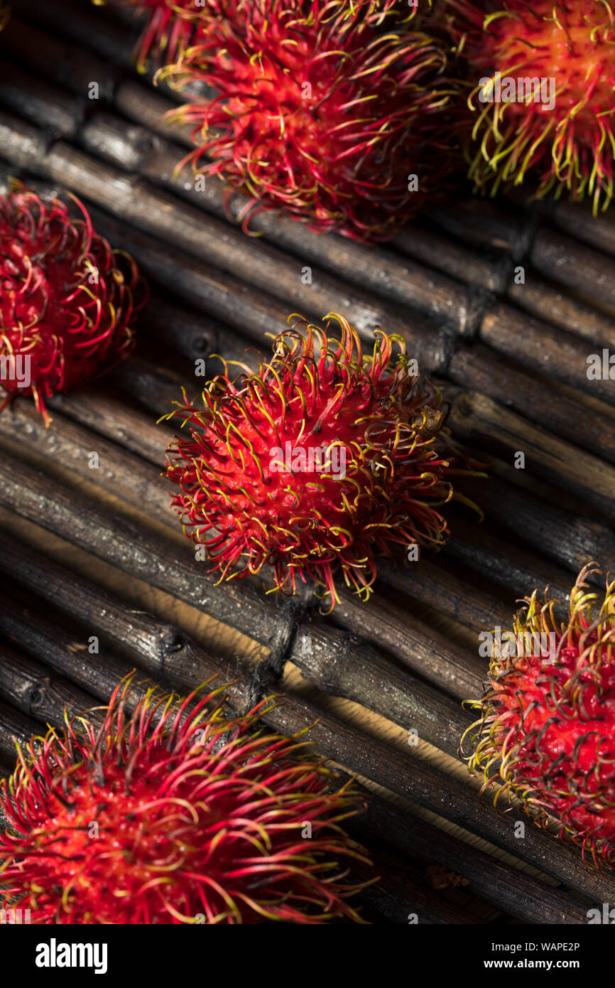 Raw Red Organic Rambutan Fruit Ready to Eat Stock Photo - Alamy
