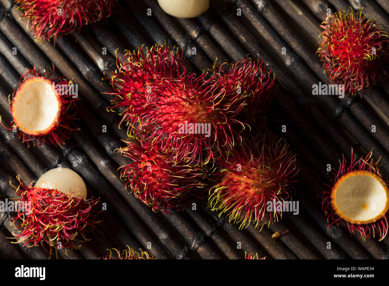 Raw Red Organic Rambutan Fruit Ready to Eat Stock Photo - Alamy