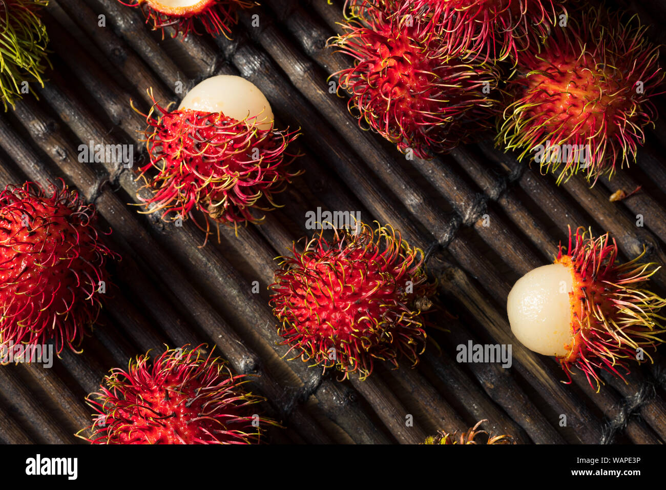 Raw Red Organic Rambutan Fruit Ready to Eat Stock Photo - Alamy
