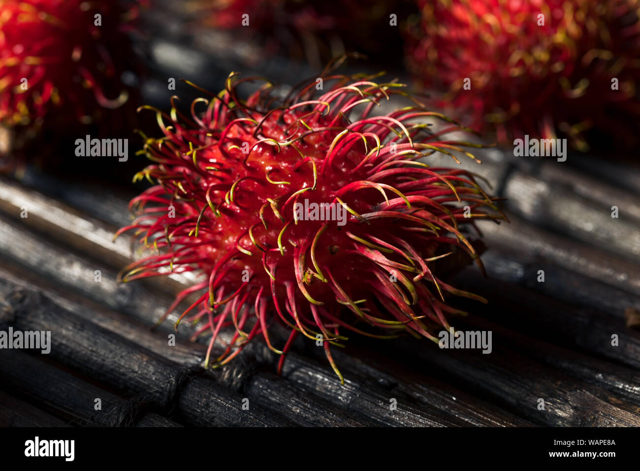 Raw Red Organic Rambutan Fruit Ready to Eat Stock Photo - Alamy