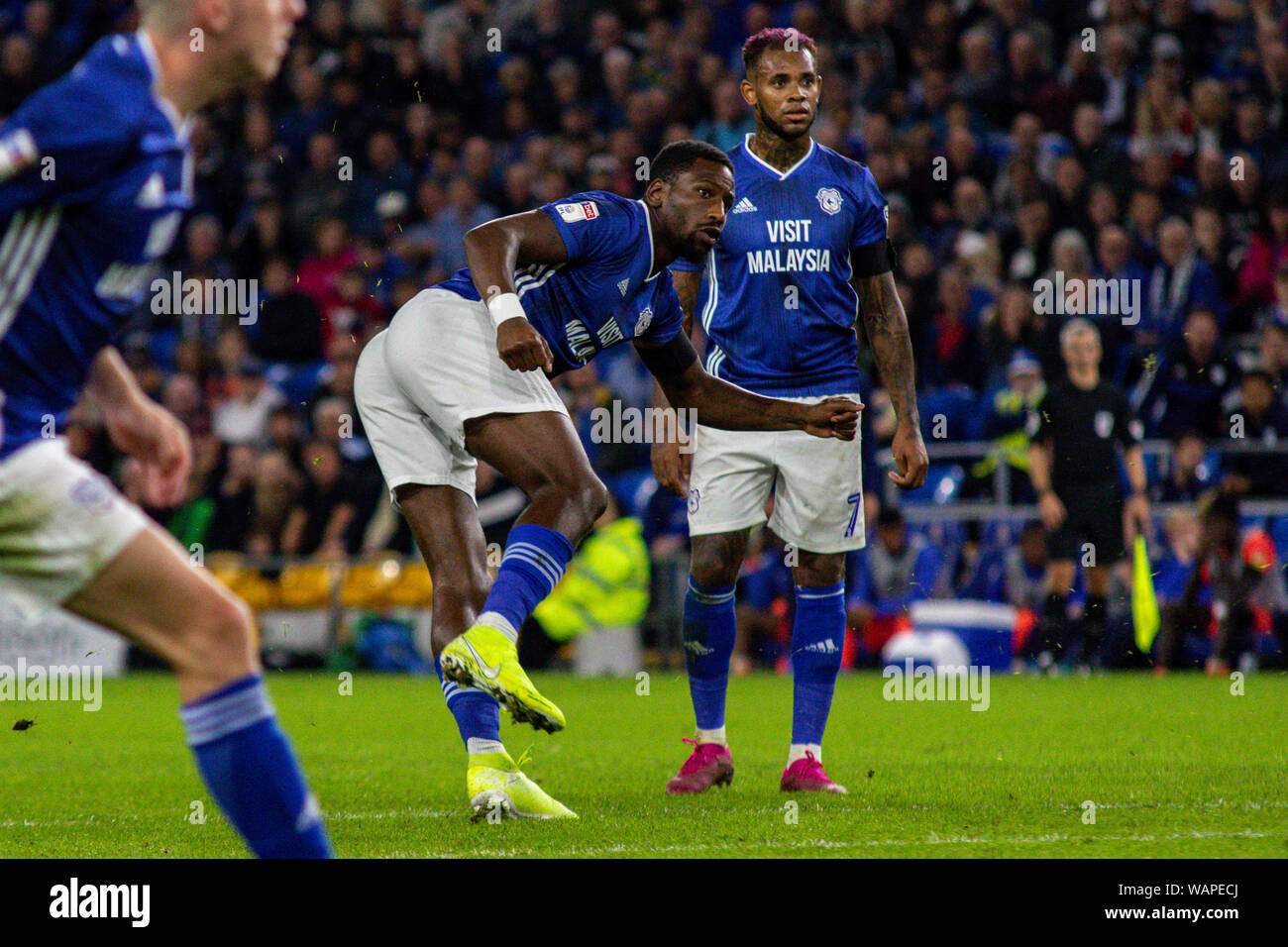 Cardiff, UK. 21st Aug, 2019. Omar Bogle of Cardiff City strikes a free ...