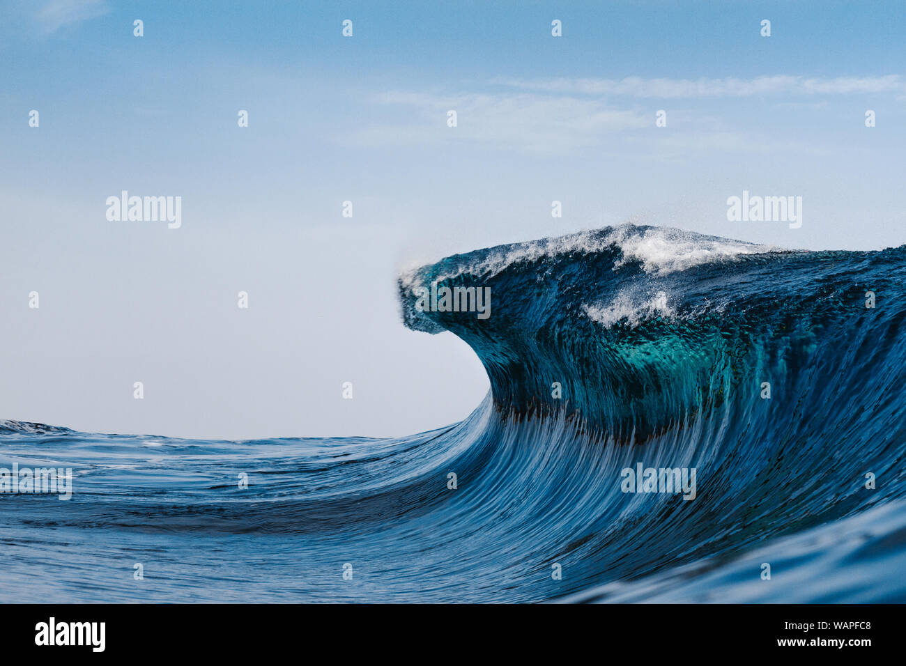 Blue wave breaking in the Atlantic Ocean Stock Photo - Alamy