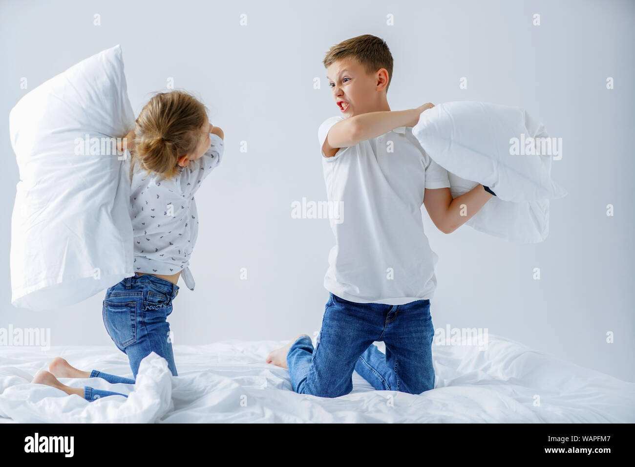 Brother sister play fighting on hi-res stock photography and images - Alamy