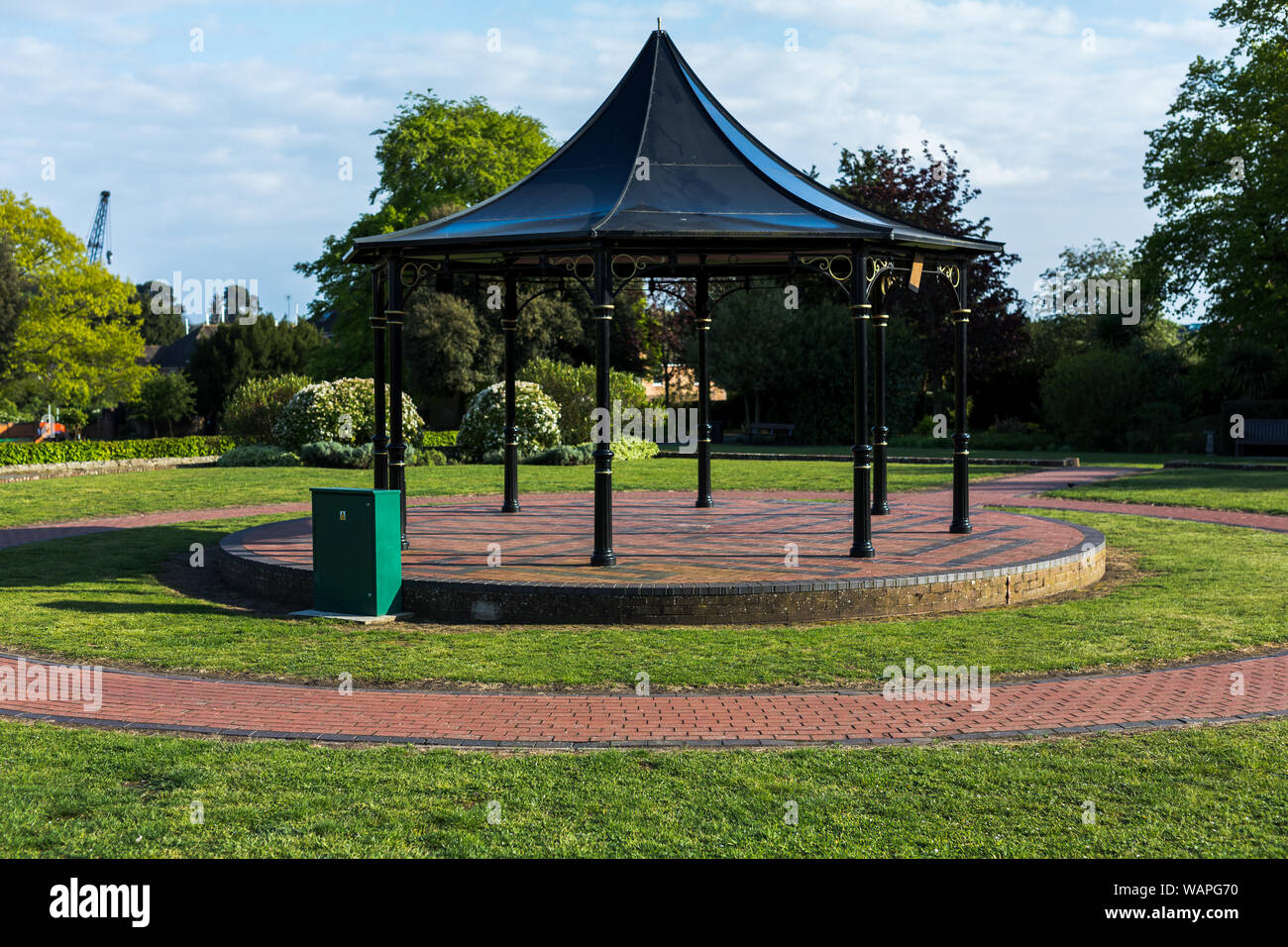 A traditional bandstand located in the middle of a popular park in ...
