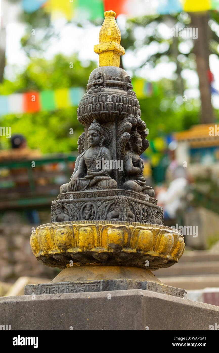 Three Buddha statues on isolated white background Swayambhunath temple ...