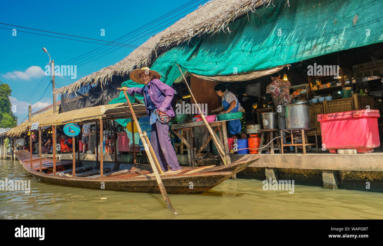 Old man driving boat hi-res stock photography and images - Alamy