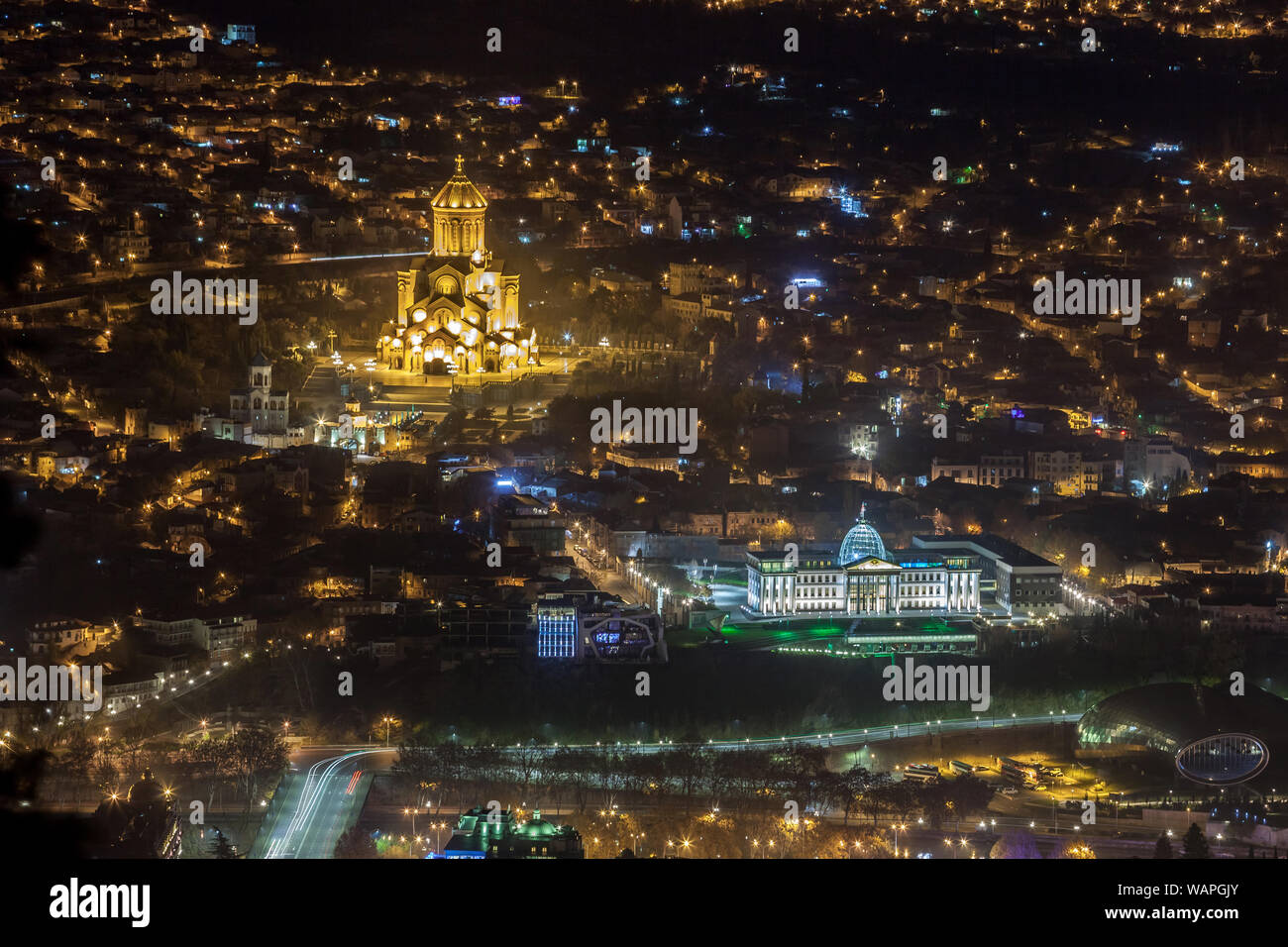 Night view of Tbilisi with Sameba (Trinity) Church and other landmarks ...