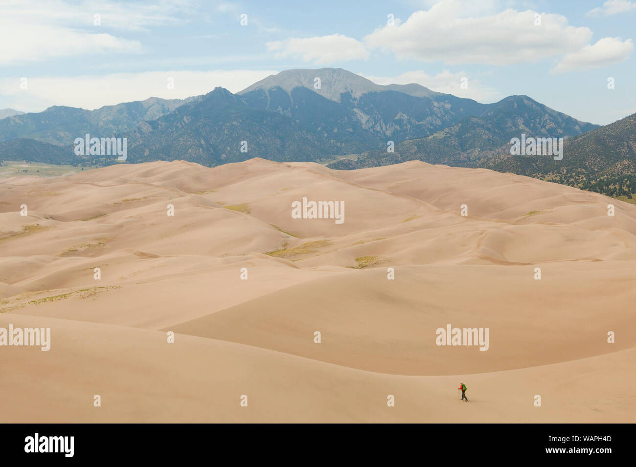 Parmenter Welty hikes across the dune field, Great Sand Dunes National ...