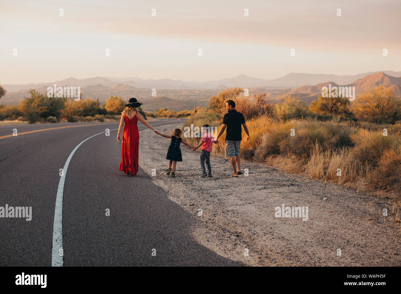 Happy Family during sunset Stock Photo - Alamy