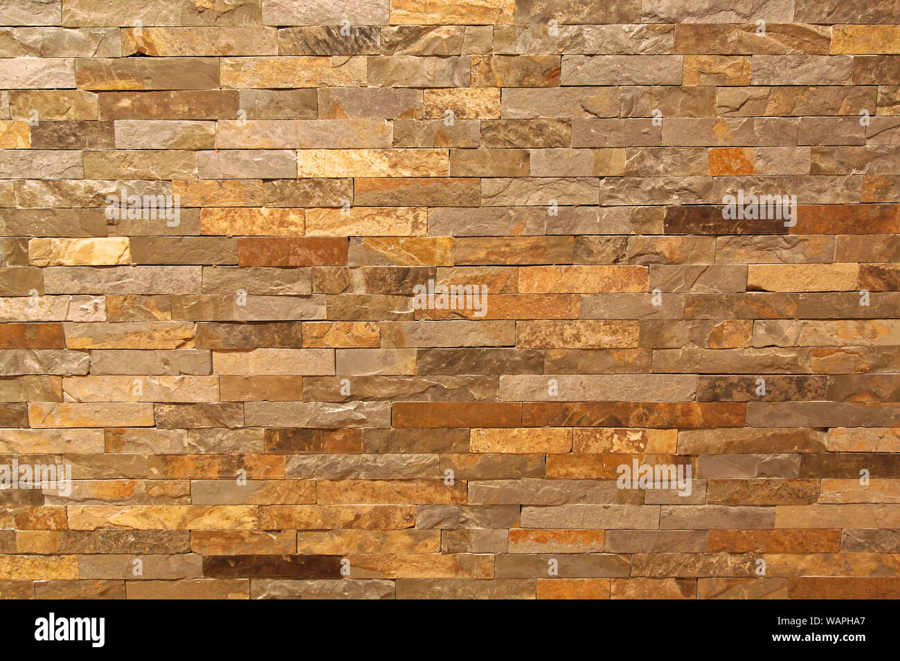 Contemporary wall made from granite tiles Stock Photo - Alamy