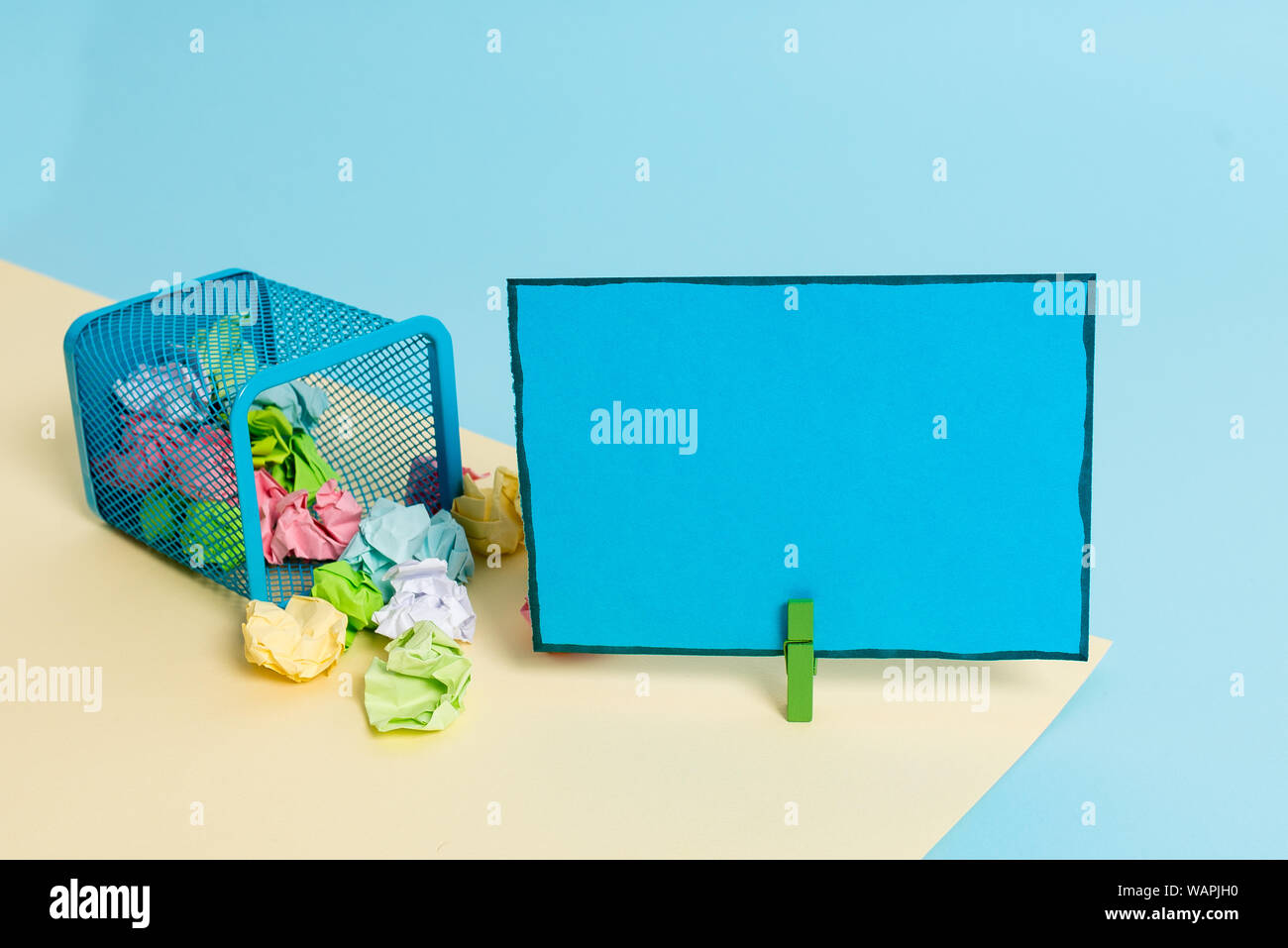 Trash bin crumpled paper clothespin empty reminder office supplies ...