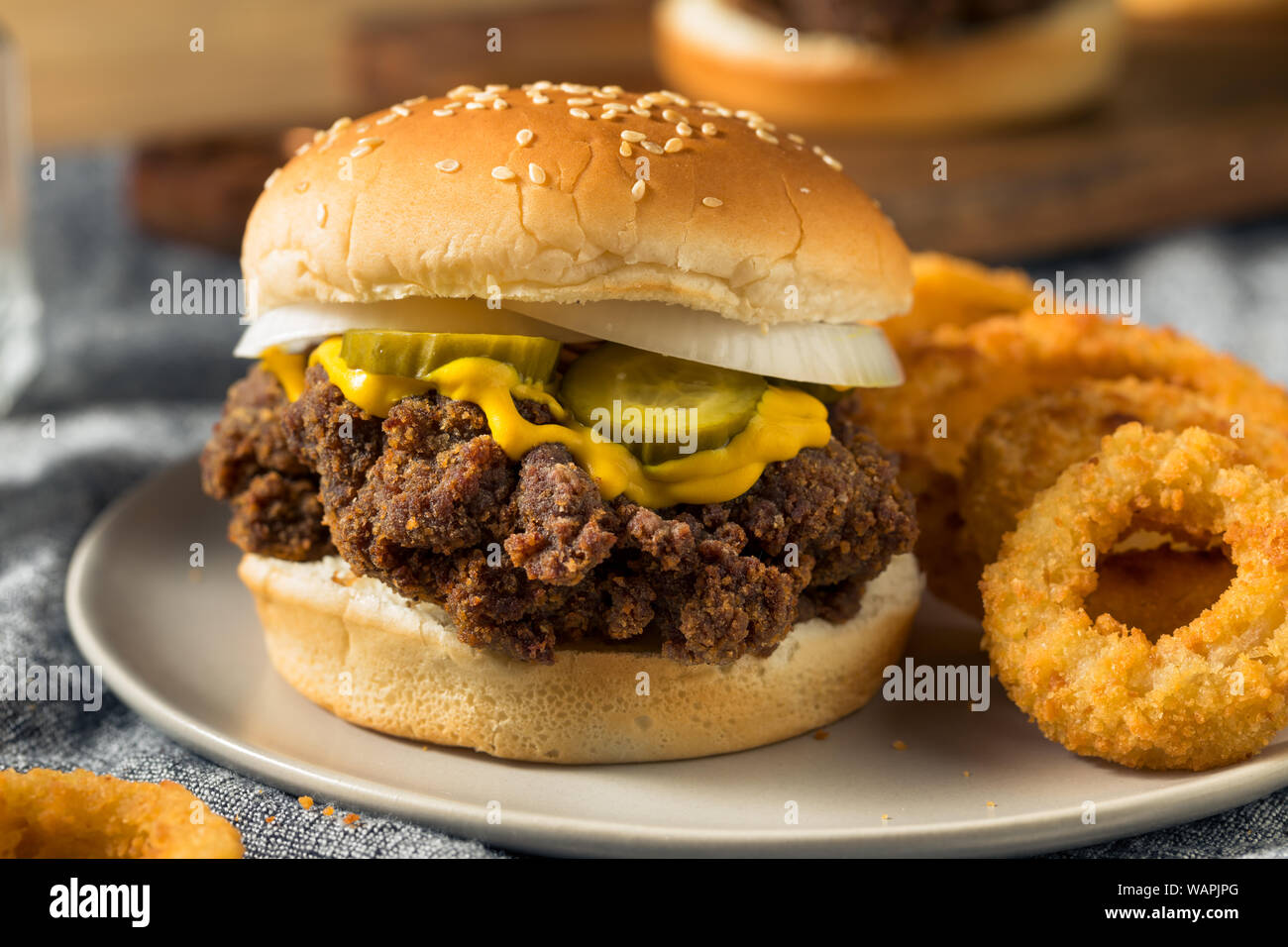 Homemade Mississippi Slug Burgers with PIckle and Onion Rings Stock ...