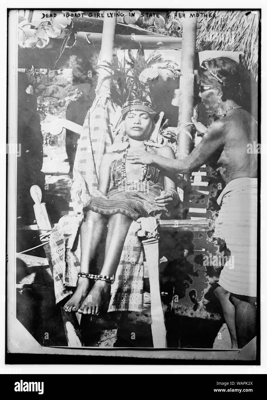 Dead Igorot girl lying in state, and her mother Stock Photo - Alamy