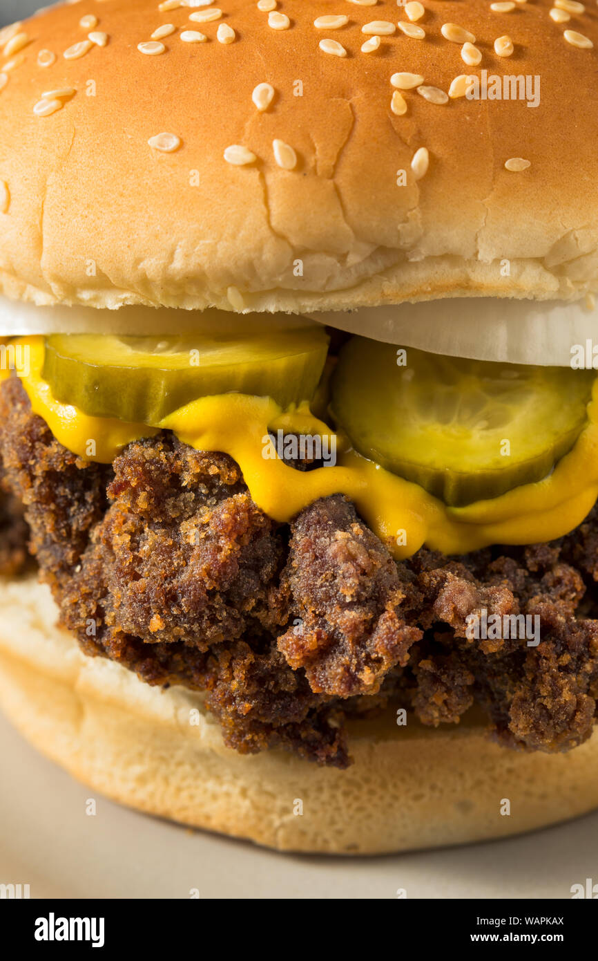 Homemade Mississippi Slug Burgers with PIckle and Onion Rings Stock ...