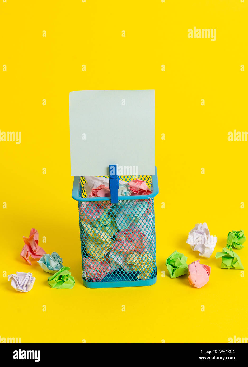 Trash bin crumpled paper clothespin empty reminder office supplies ...