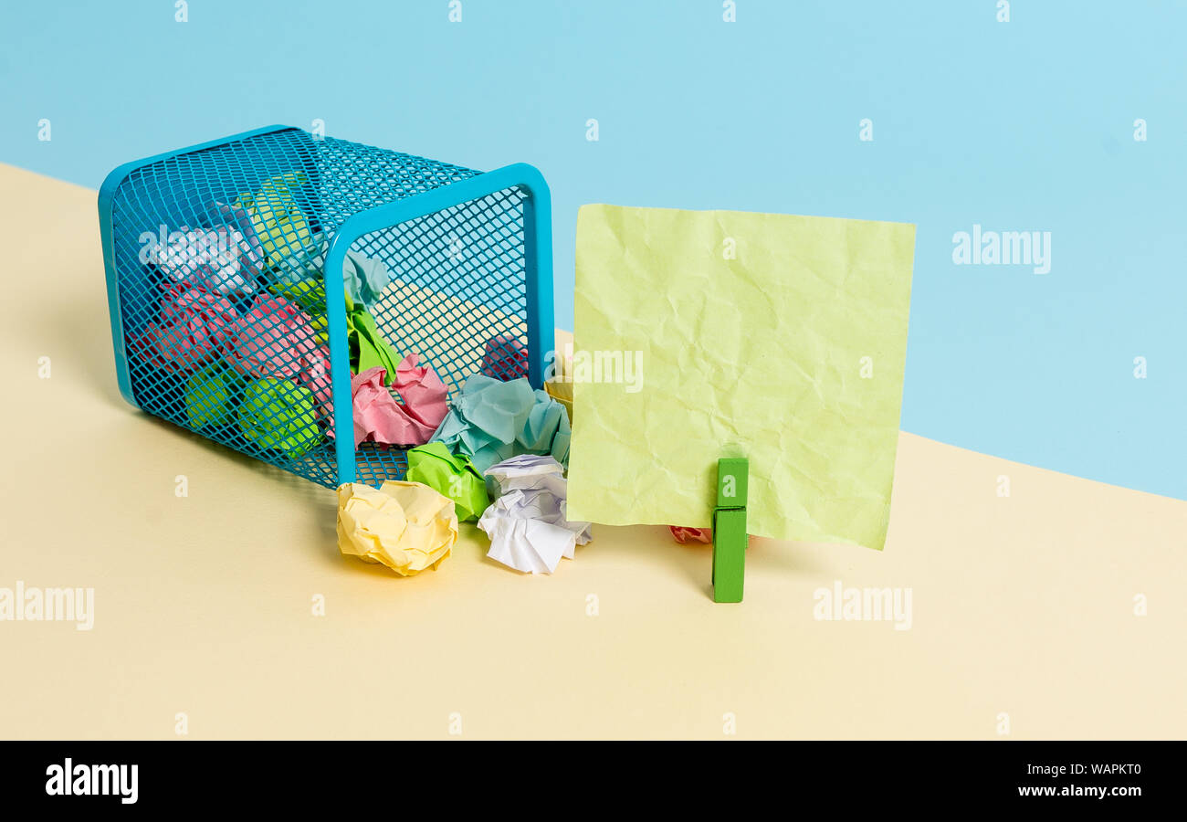 Trash bin crumpled paper clothespin empty reminder office supplies ...
