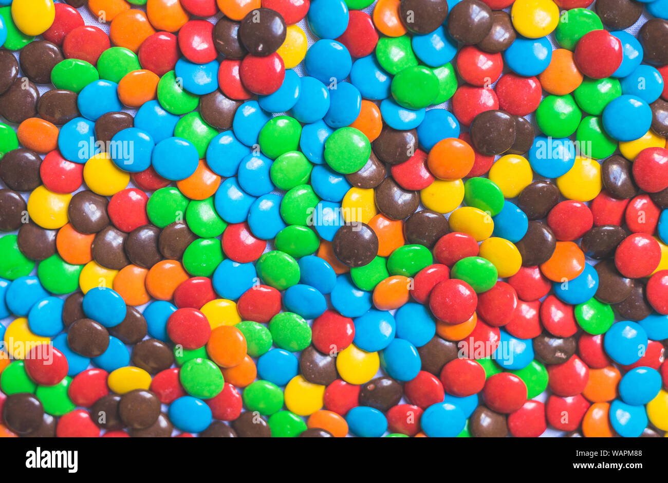 Assortment of sweet dessert colorful chocolate candy. Food background ...