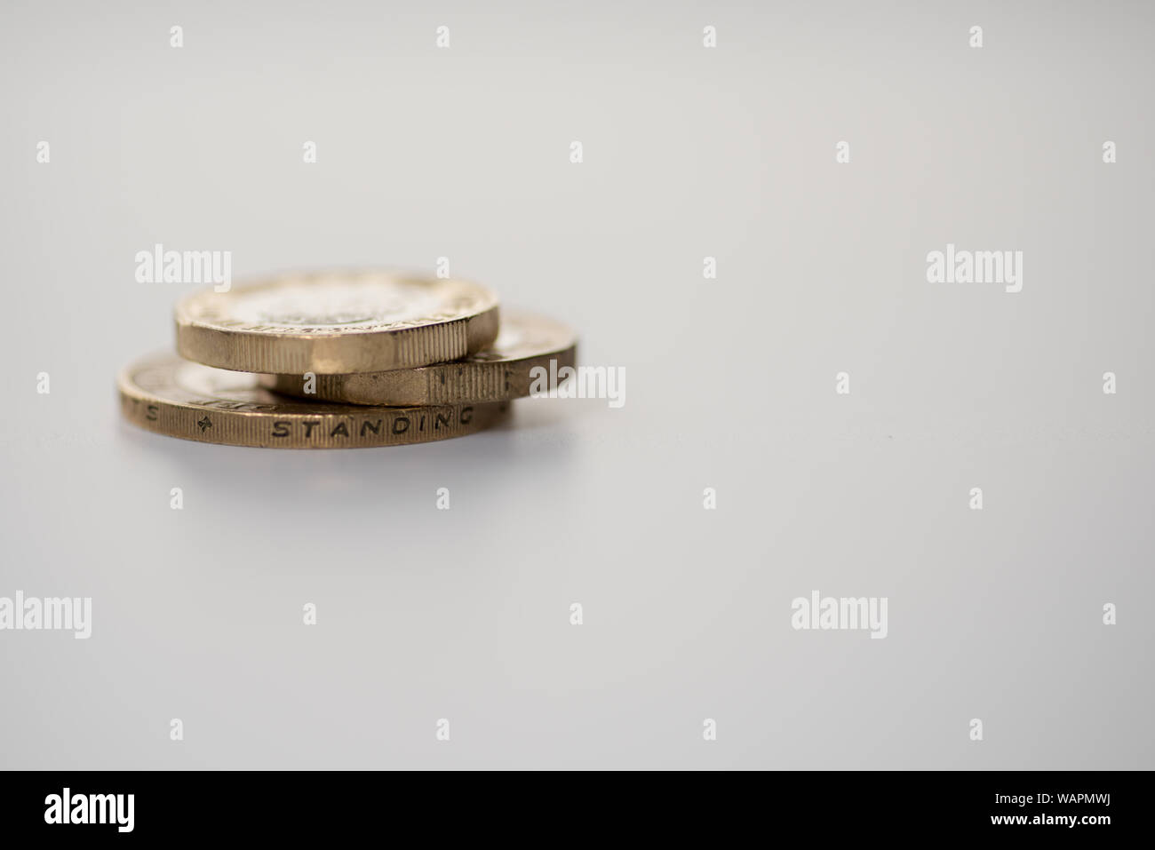 Stacked up coins Stock Photo - Alamy
