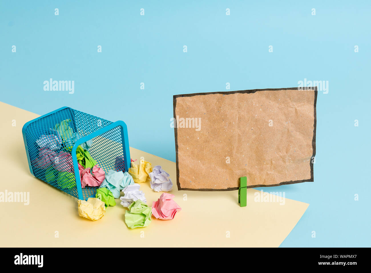 Trash bin crumpled paper clothespin empty reminder office supplies ...