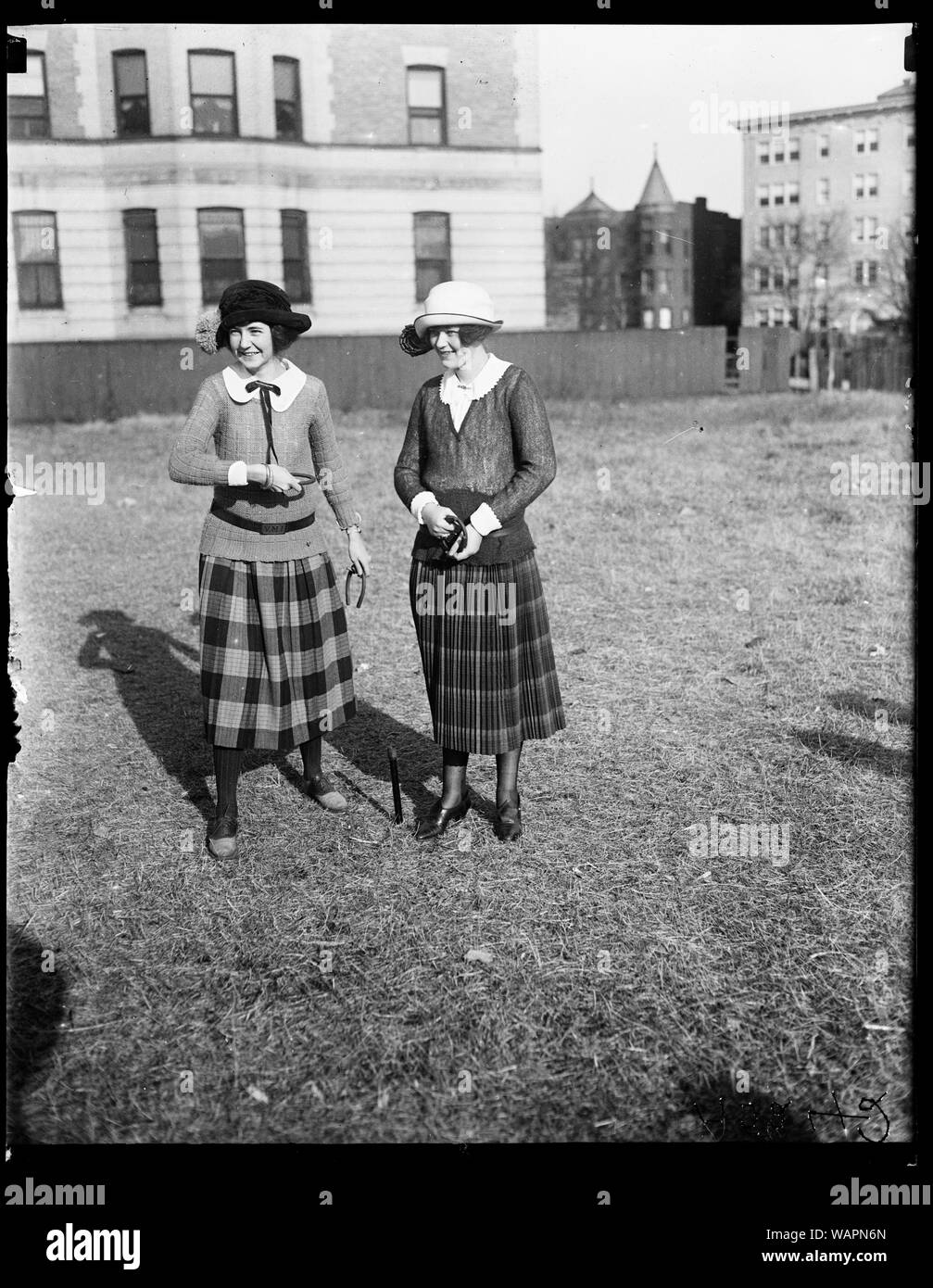 Debutantes playing horse shoes. Left to right: Elizabeth Beale ...