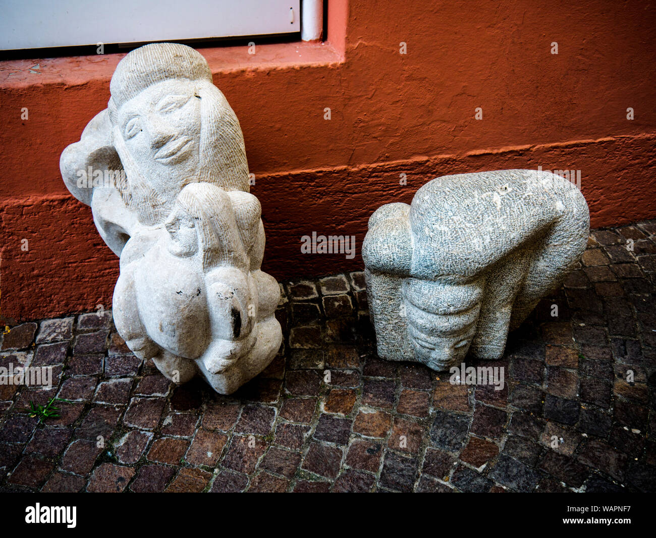 Sculptures in the narrow streets of Malcesine on he lovely lake Garda ...