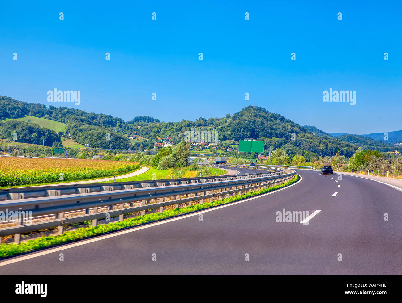 landscape with highways and driving cars Stock Photo - Alamy