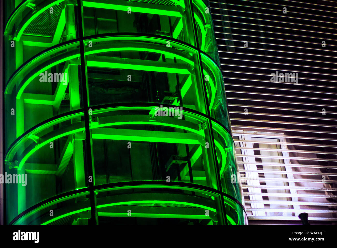 elevator shaft in green neon light Stock Photo - Alamy