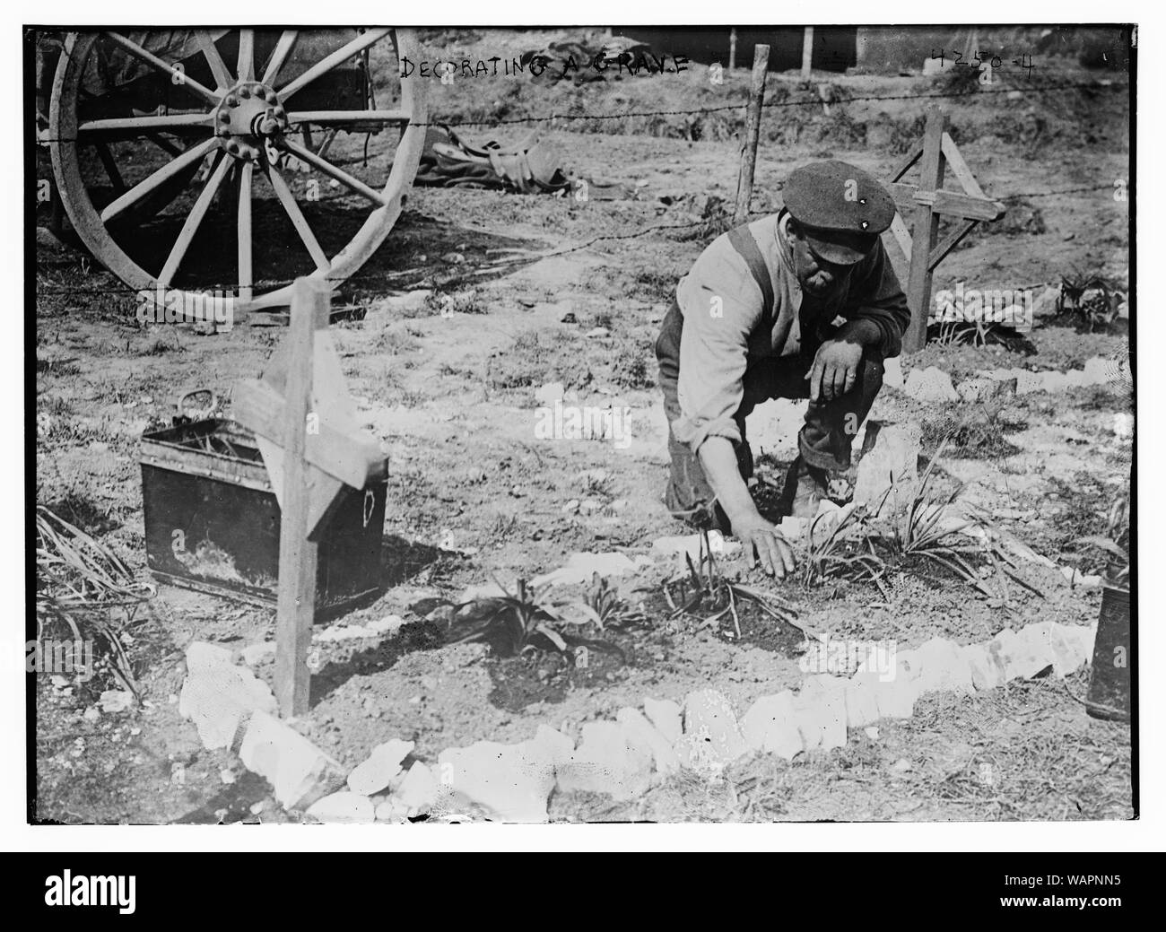 Mourning at a grave Cut Out Stock Images & Pictures - Alamy