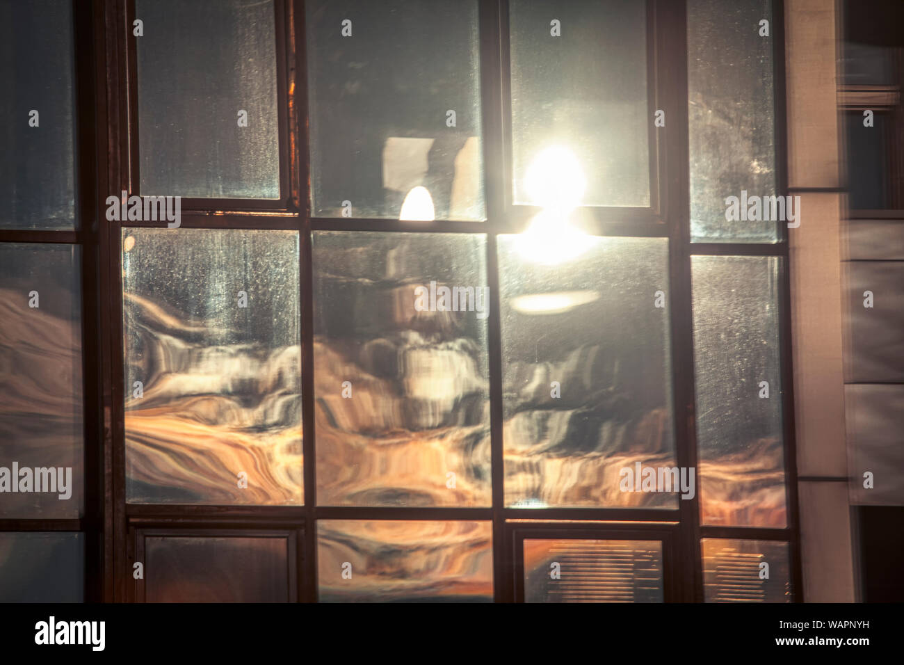 sun glow reflection in windows glass Stock Photo - Alamy