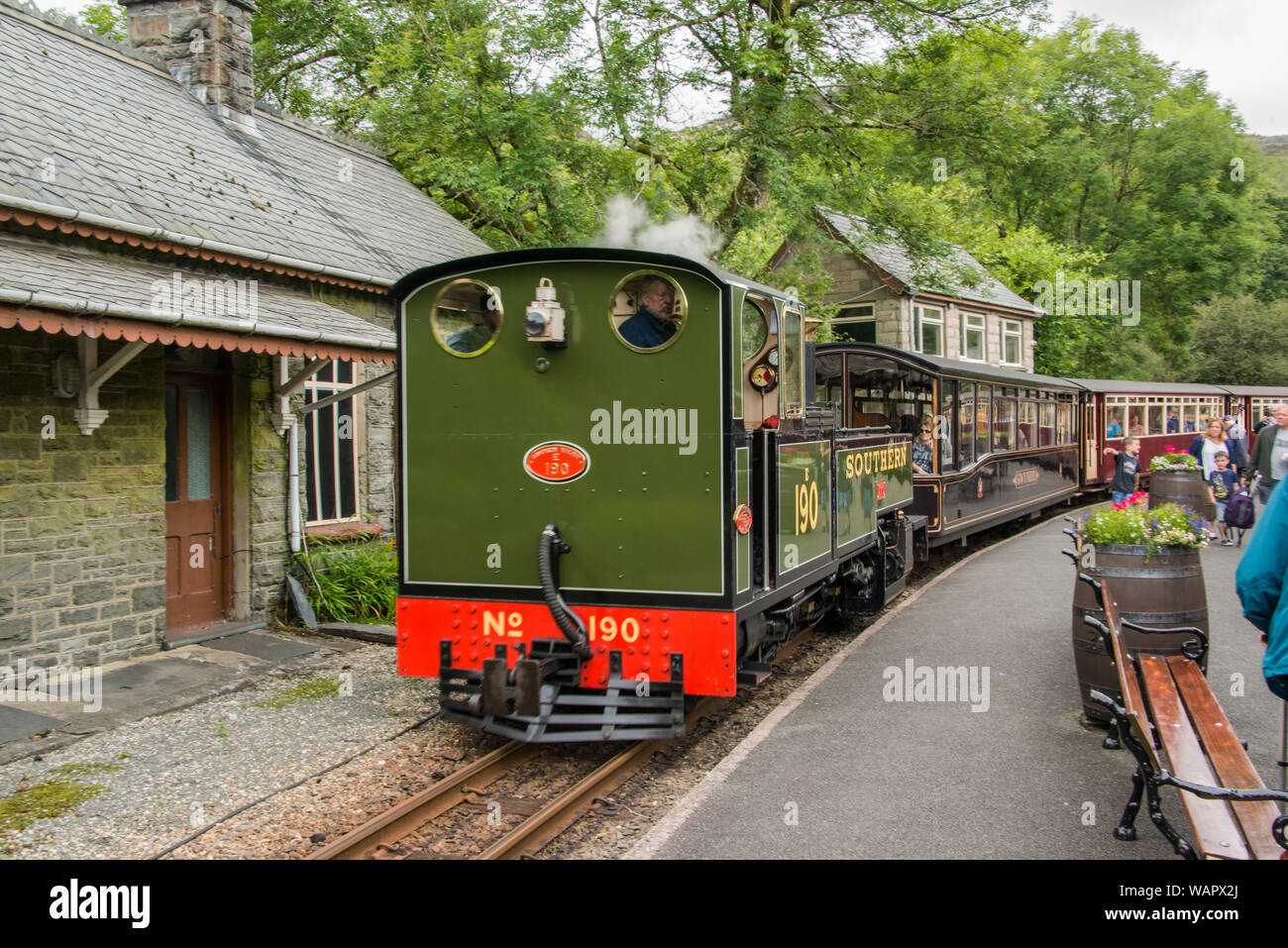Steam train arriving at Tanybwlch station Stock Photo - Alamy
